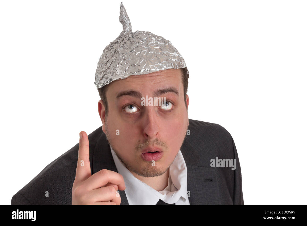 distraught looking conspiracy believer in suit with aluminum foil head ...