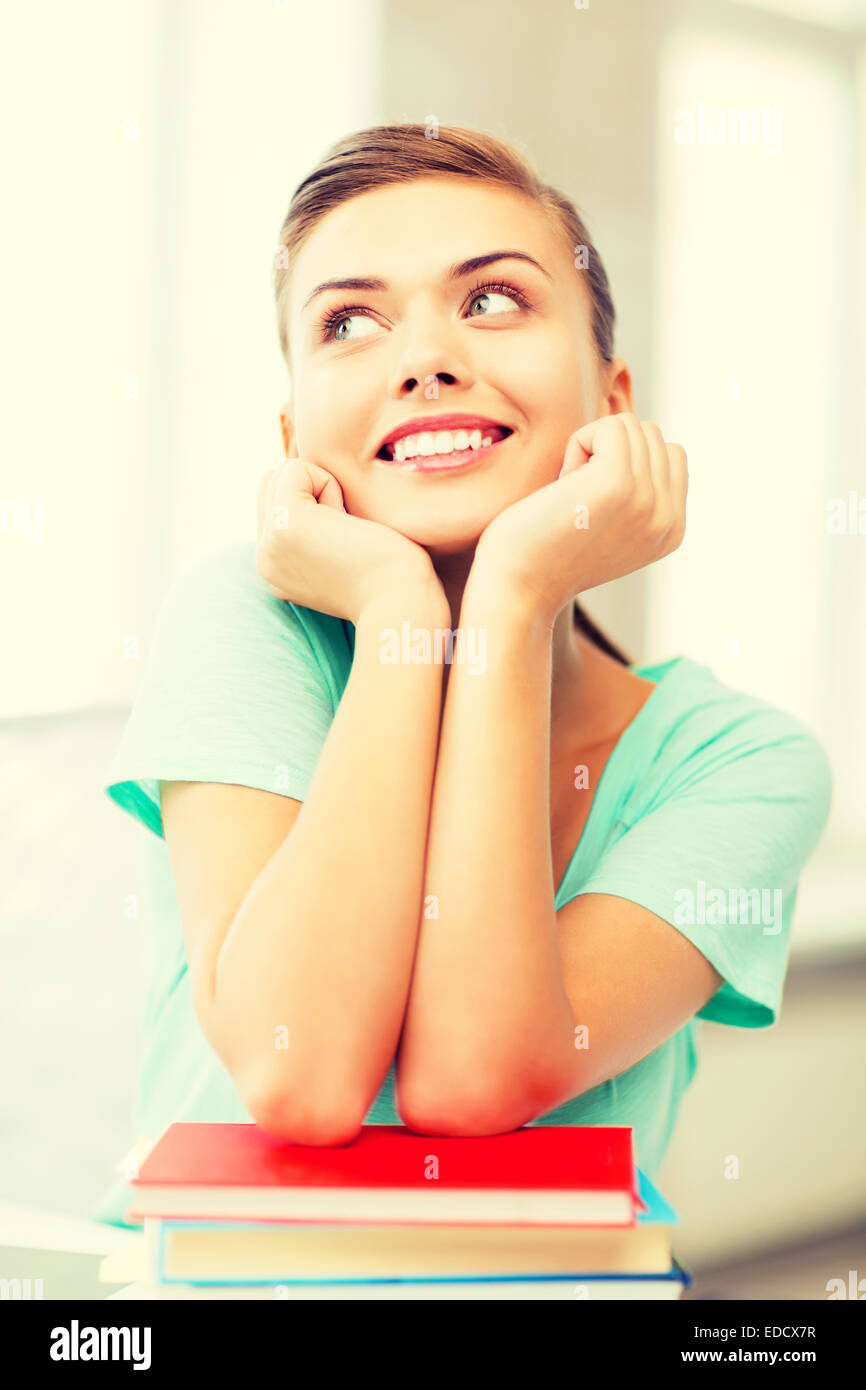 happy smiling student girl with books Stock Photo - Alamy