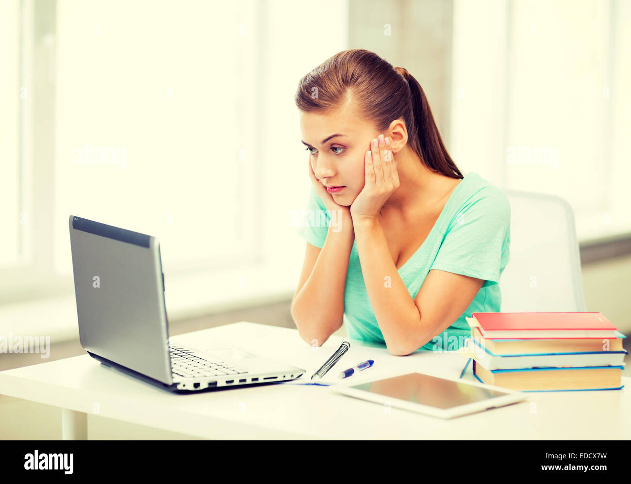 stressed student with computer at home Stock Photo - Alamy