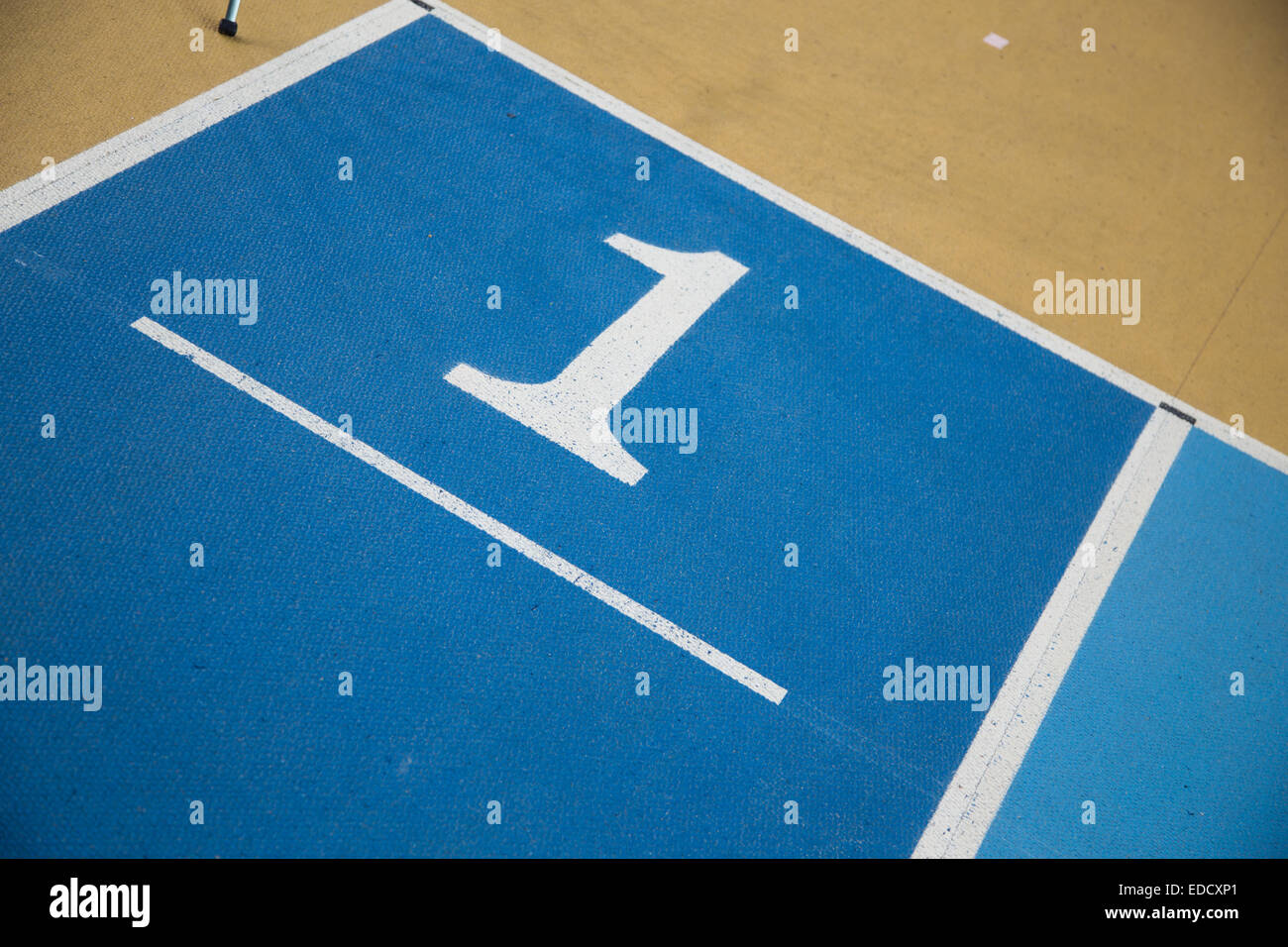 Numbers at finish line of 60 meters running field Stock Photo - Alamy