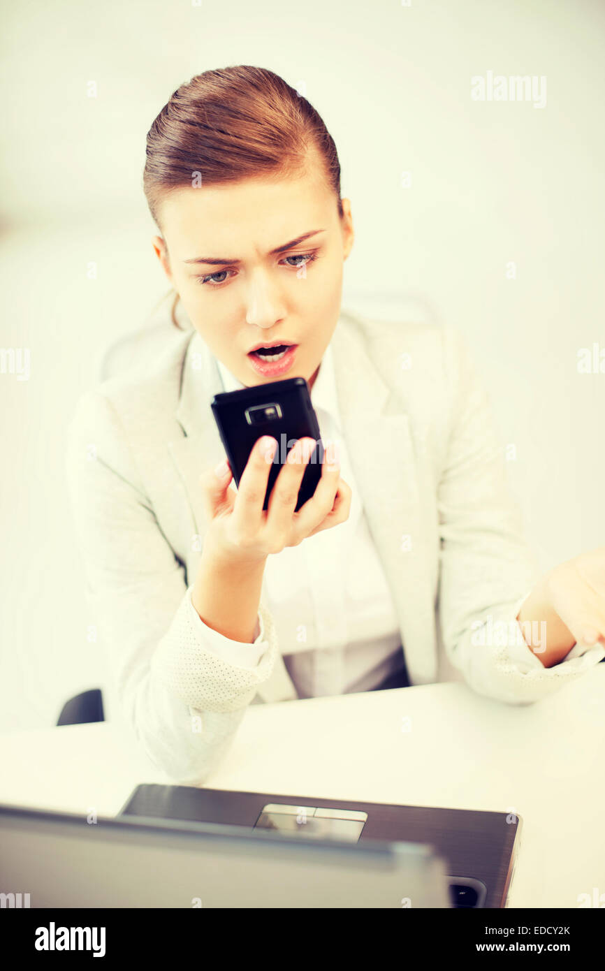 woman shouting into smartphone Stock Photo - Alamy