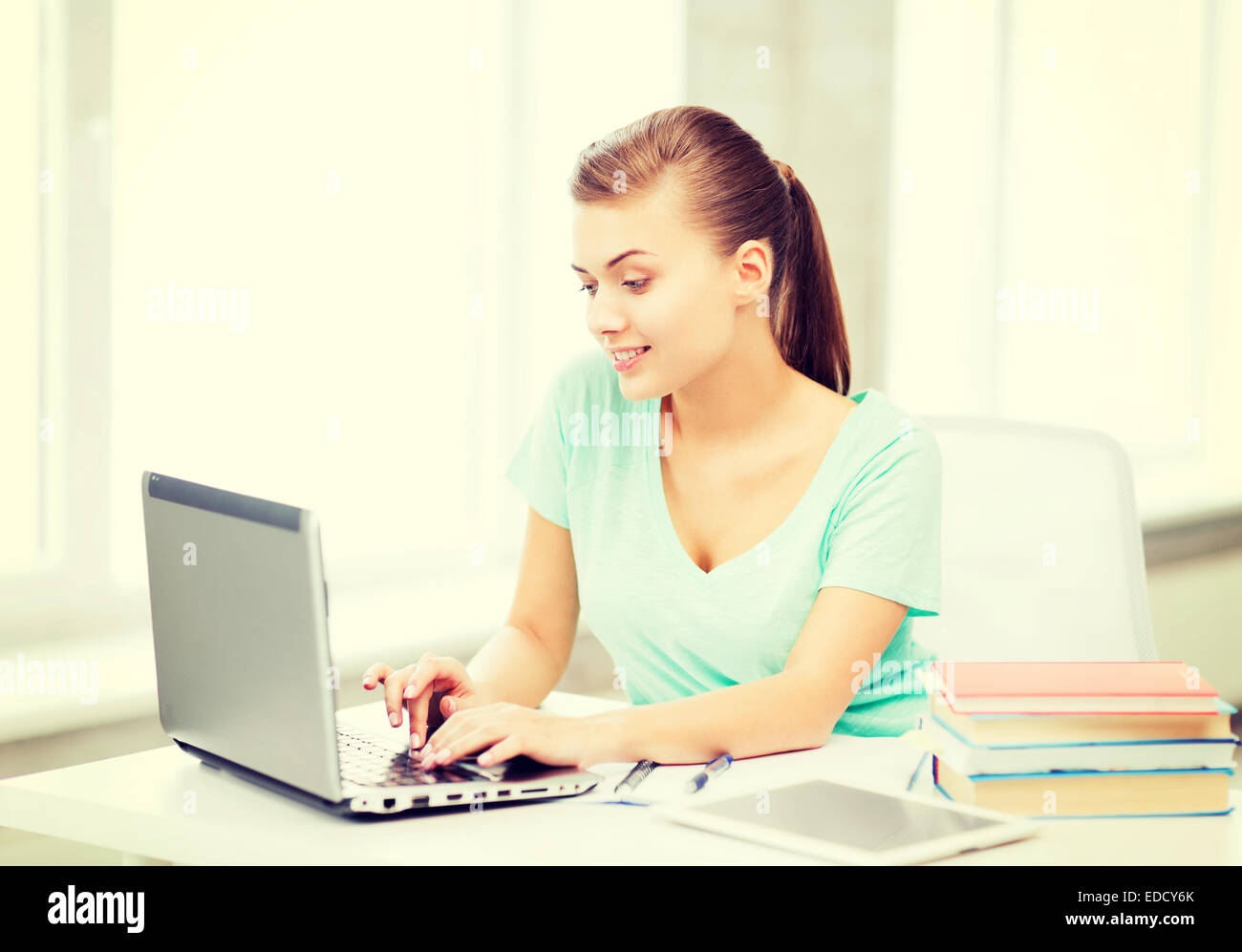 smiling student girl with laptop Stock Photo - Alamy