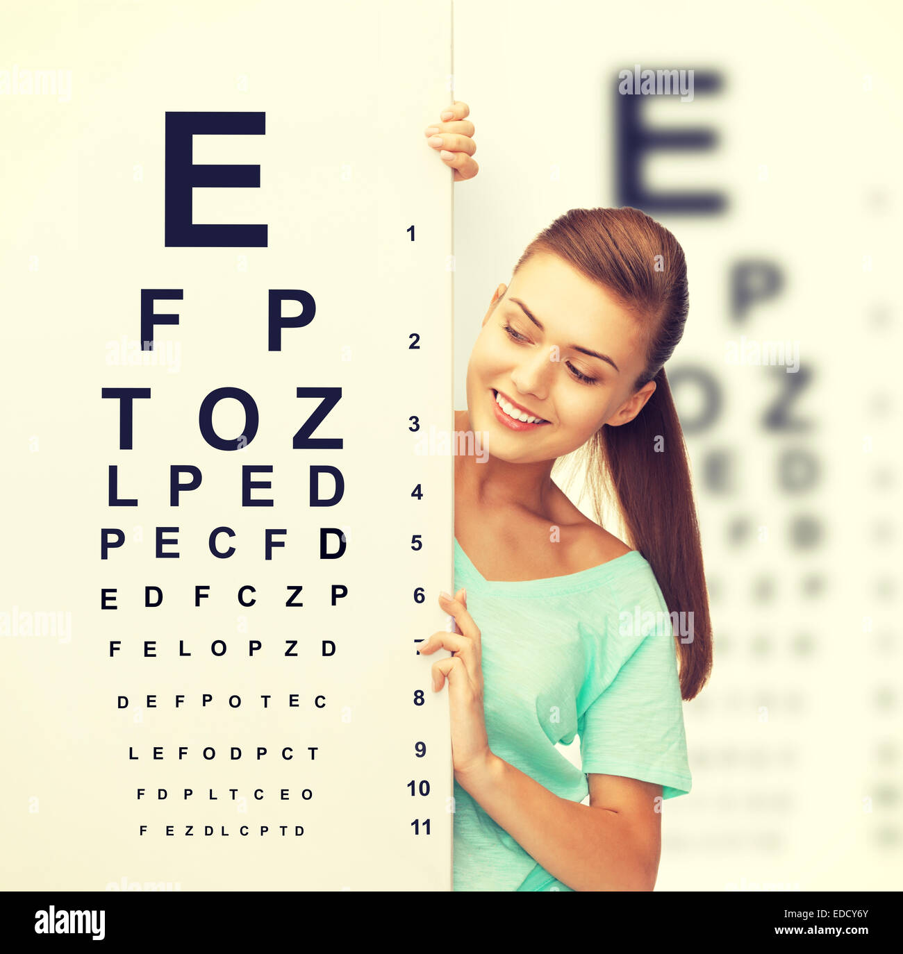 woman in eyeglasses with eye chart Stock Photo - Alamy