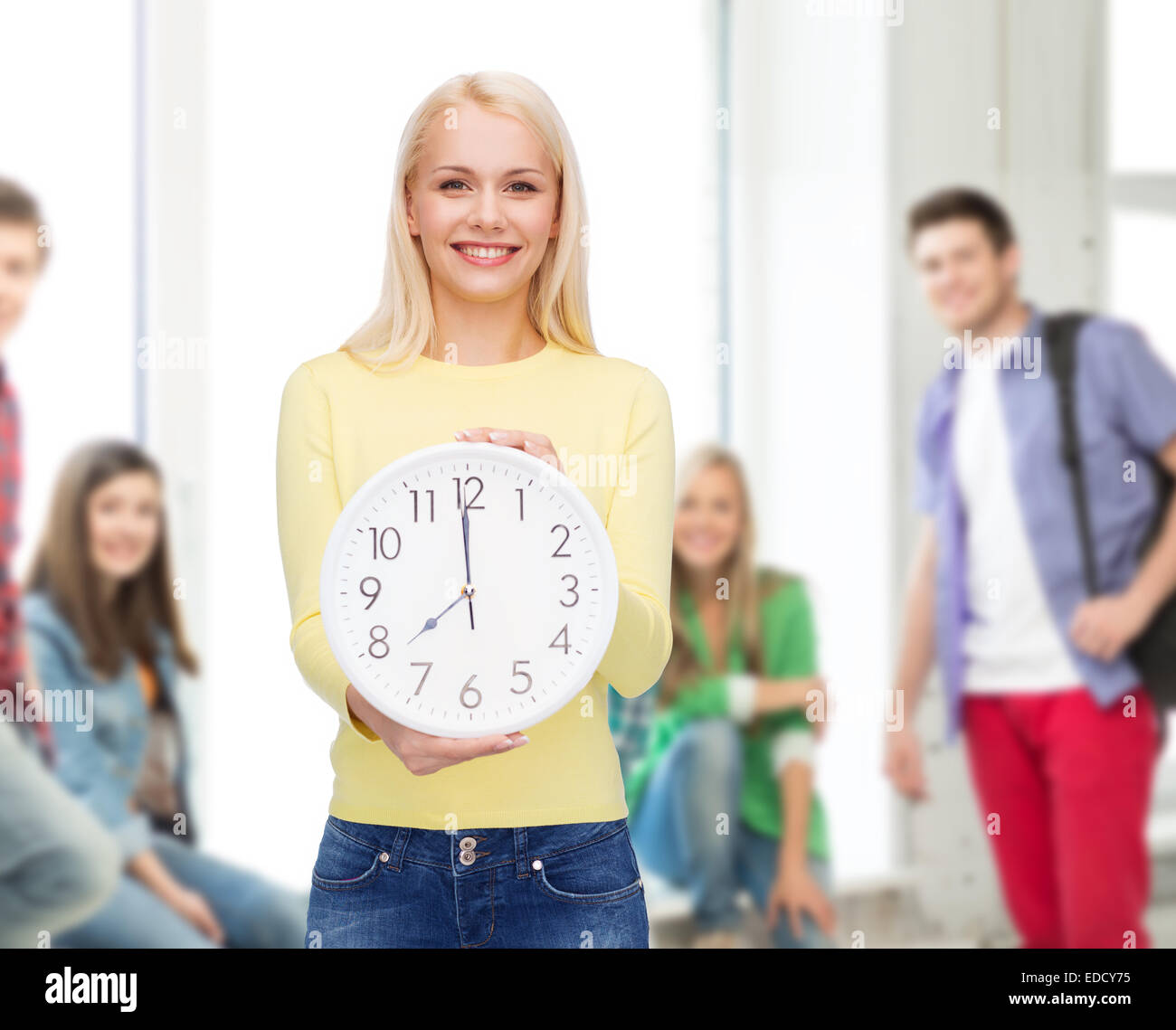 student with wall clock Stock Photo - Alamy