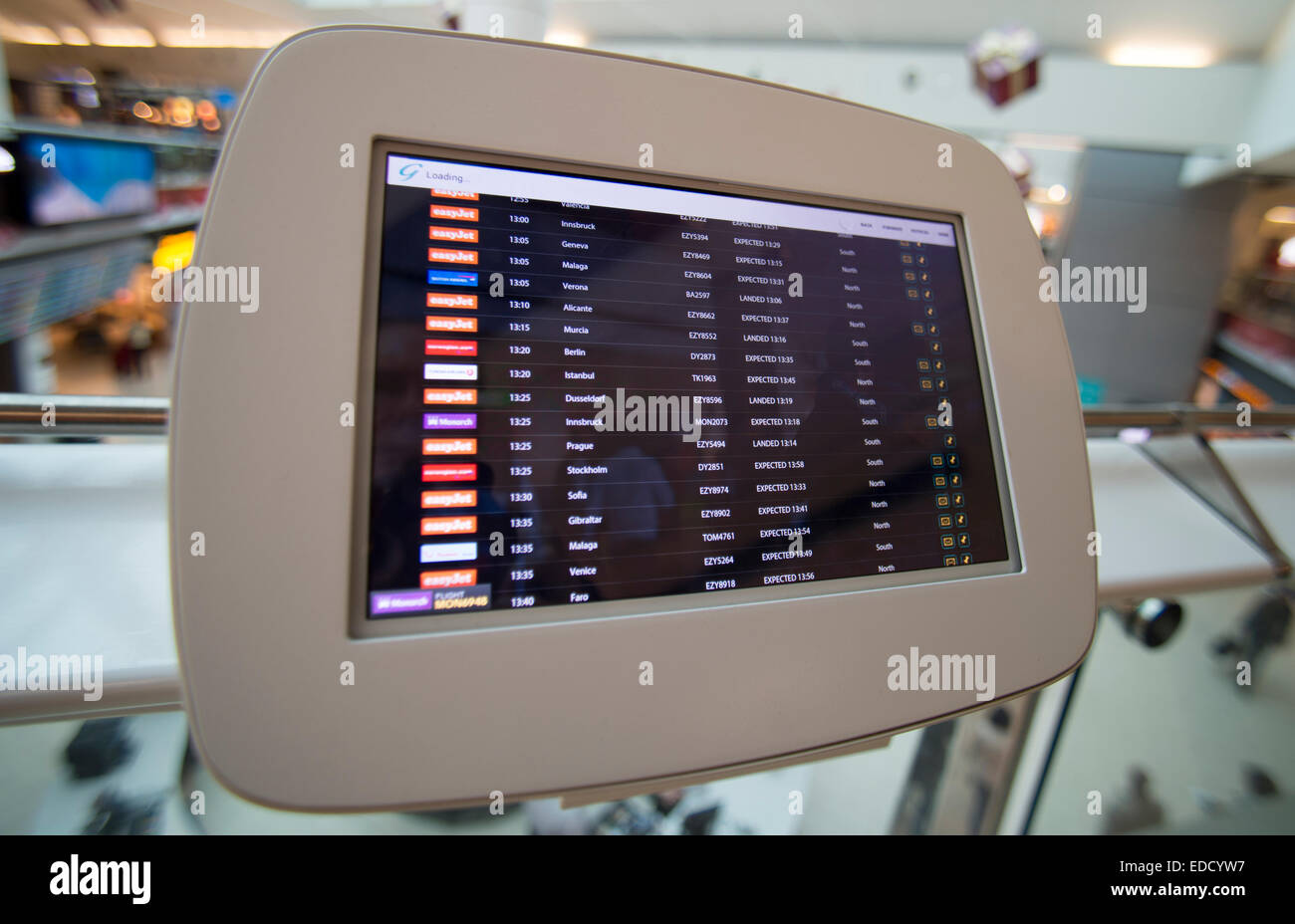 modern touchscreen flight information screen at Gatwick Airport ...