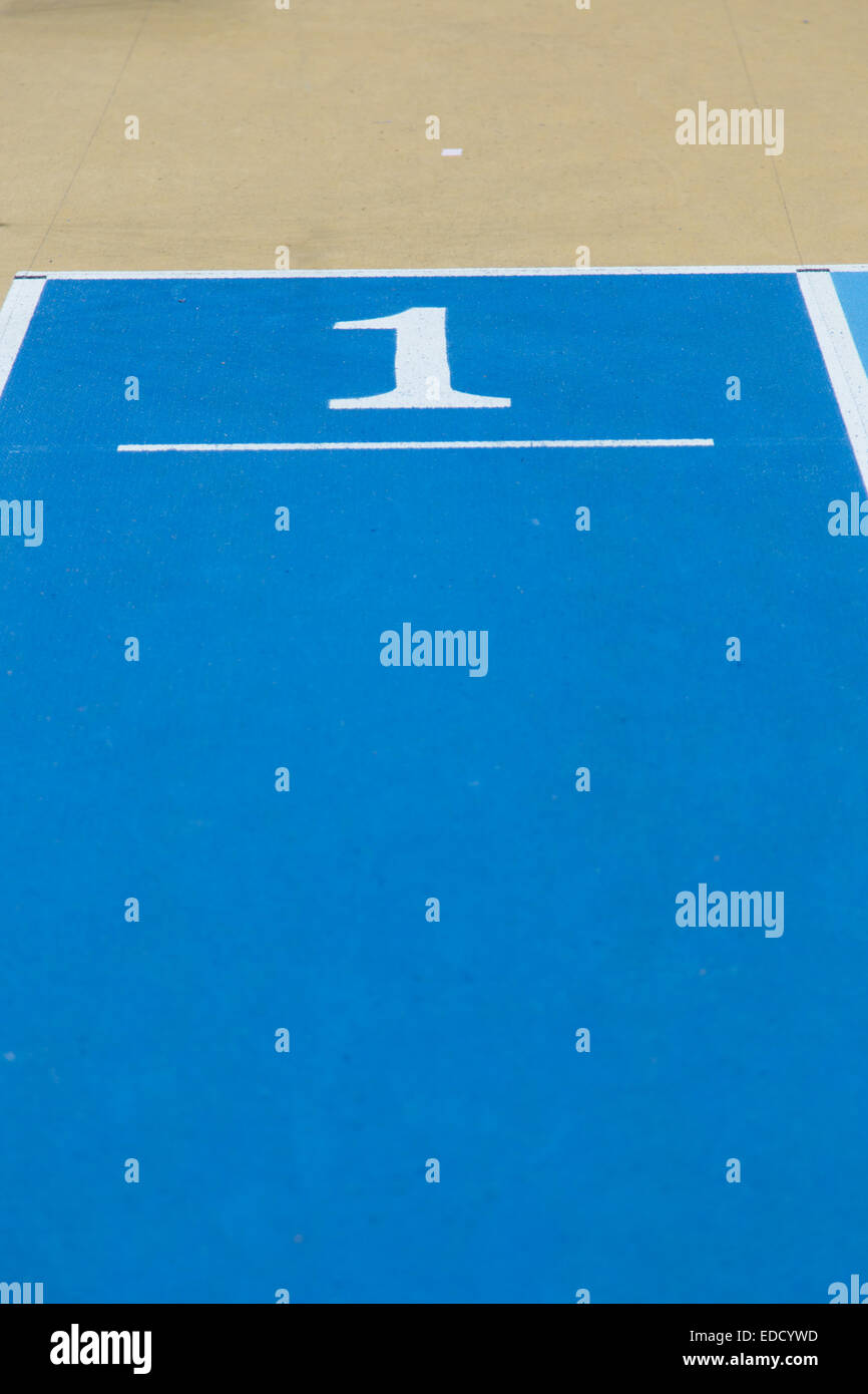 Numbers at finish line of 60 meters running field Stock Photo - Alamy