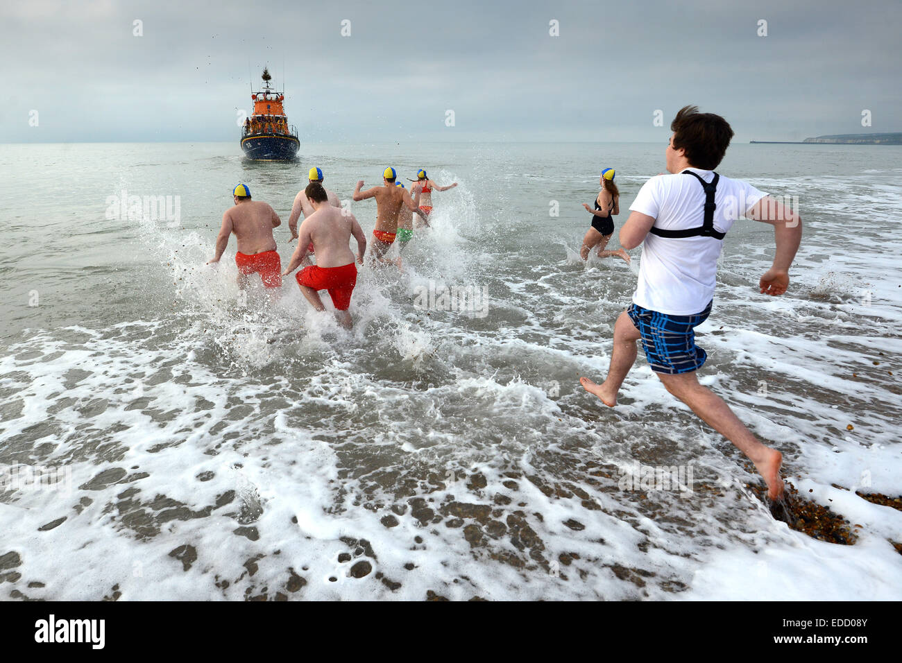 New Year dip in the sea by Seaford Lifeguards, Seaford Bay, Sussex, UK ...