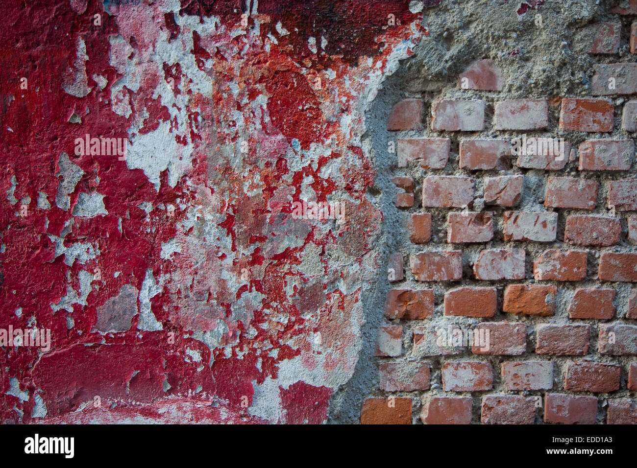 first floor of the brick wall with murals Stock Photo - Alamy