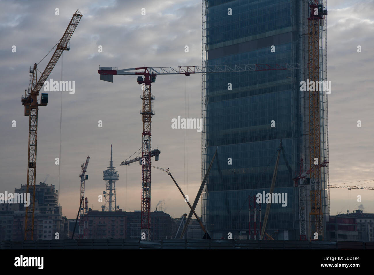 urban landscape with crane and skyscraper Stock Photo - Alamy
