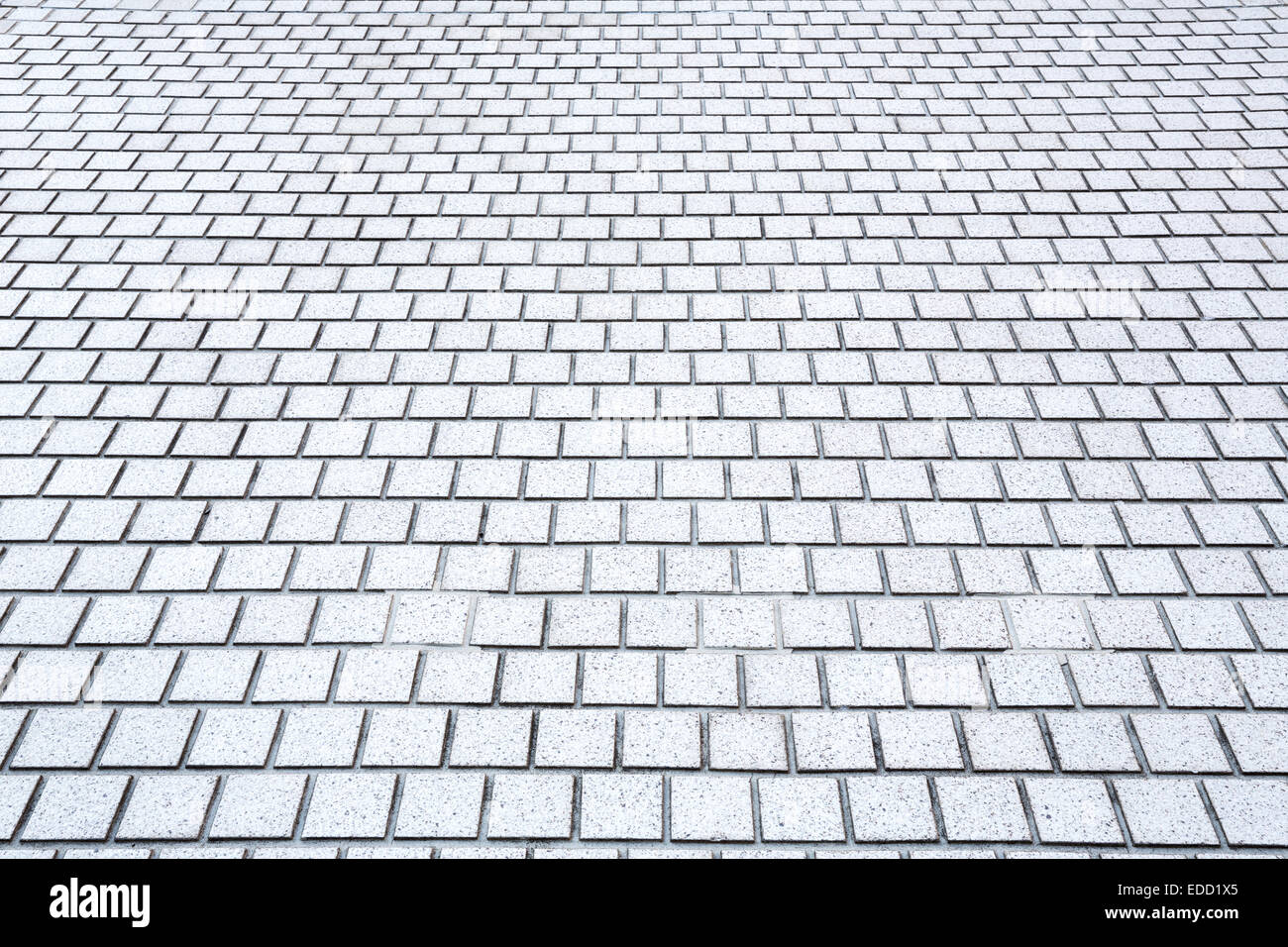 Perspective of concrete brick pavement road Stock Photo - Alamy