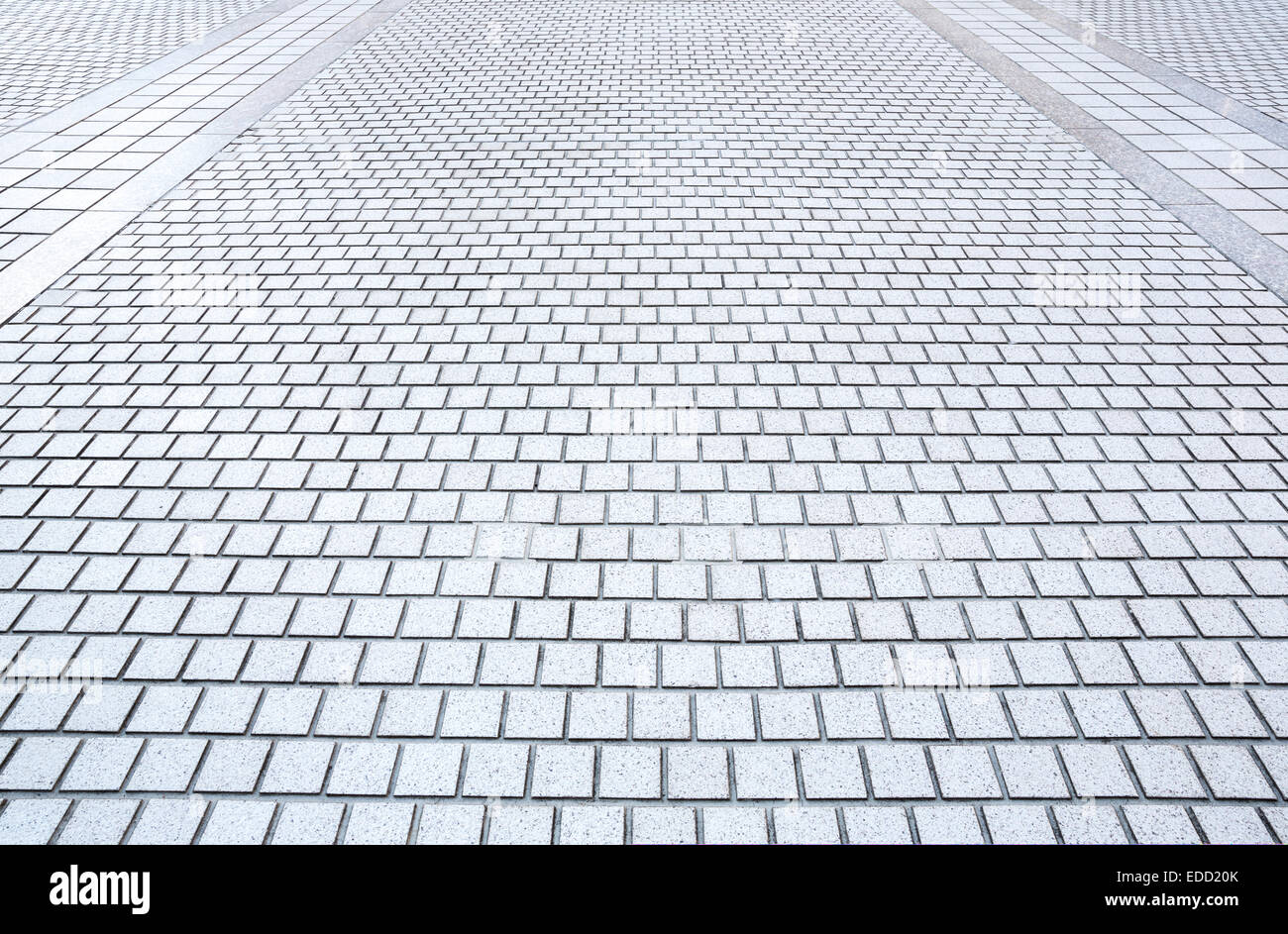 Perspective of concrete brick pavement road Stock Photo - Alamy