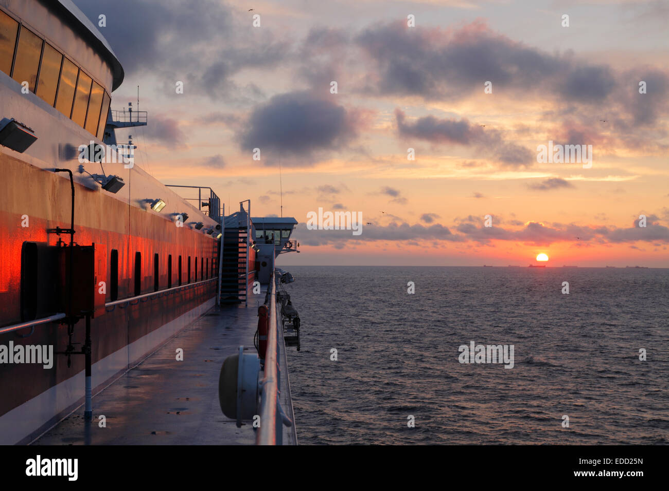 sunset seen from a ferry Stock Photo - Alamy