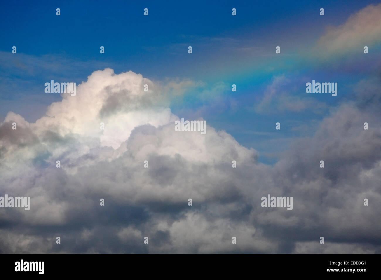 Rainbow blue sky clouds hi-res stock photography and images - Alamy