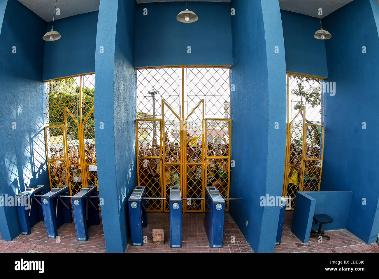 2014 FIFA World Cup - Brazilian football fans crowd outside the gate as ...