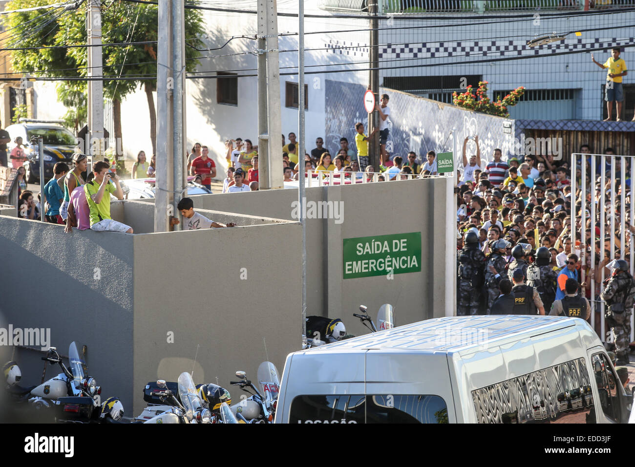2014 FIFA World Cup - Brazilian football fans crowd outside the gate as ...