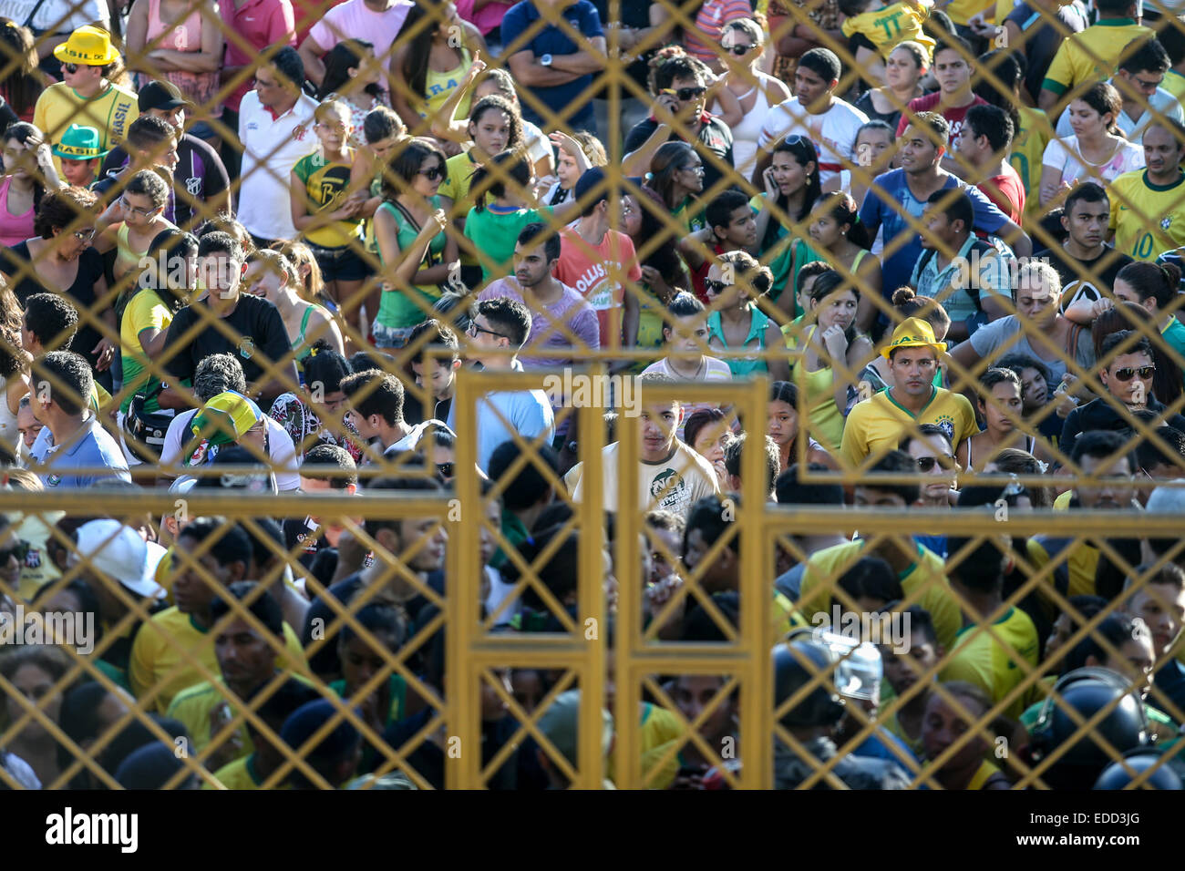 2014 FIFA World Cup - Brazilian football fans crowd outside the gate as ...
