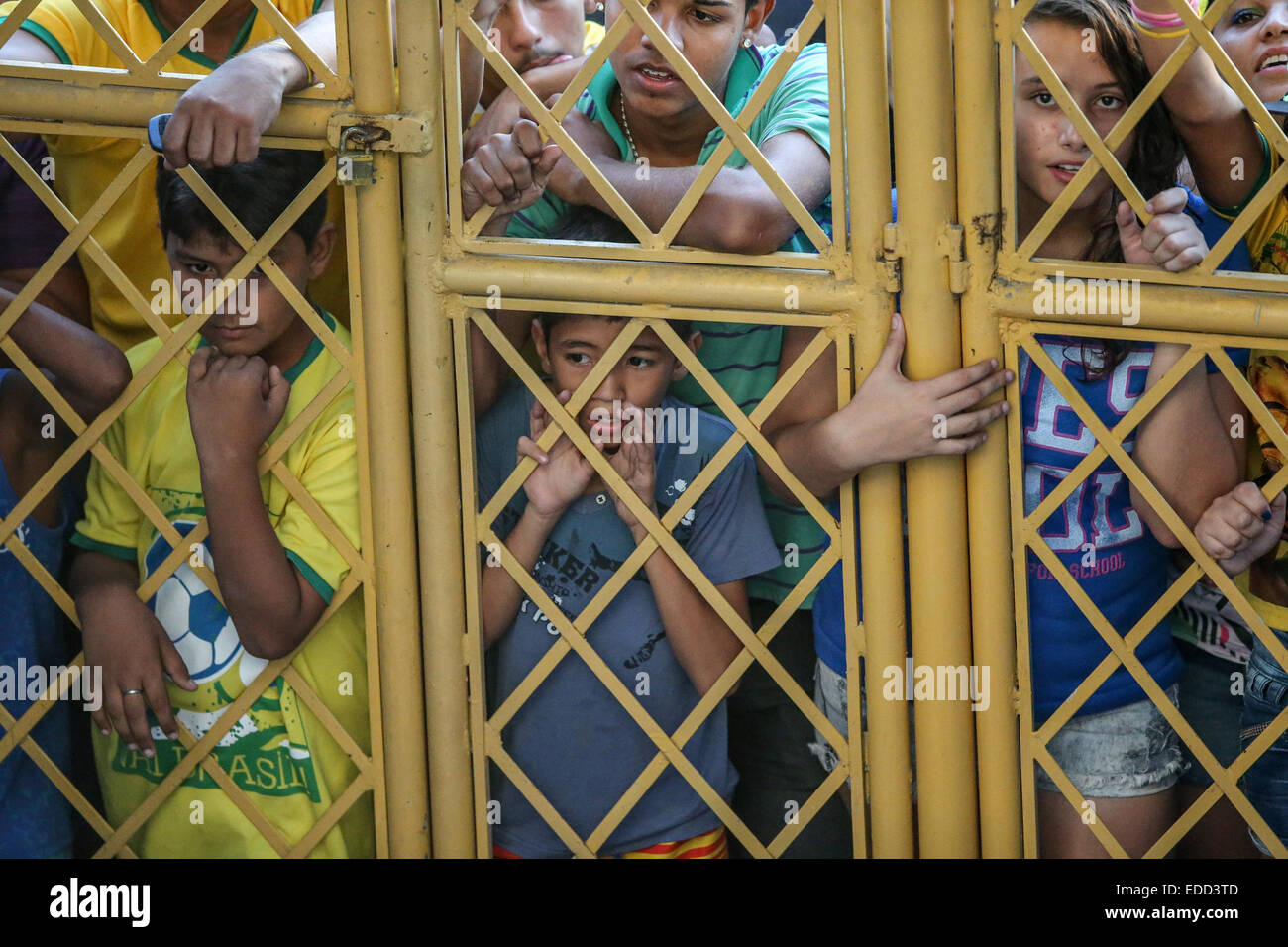 2014 FIFA World Cup - Brazilian football fans crowd outside the gate as ...