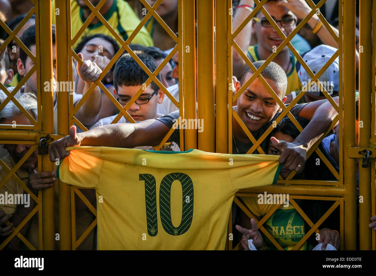 2014 FIFA World Cup - Brazilian football fans crowd outside the gate as ...