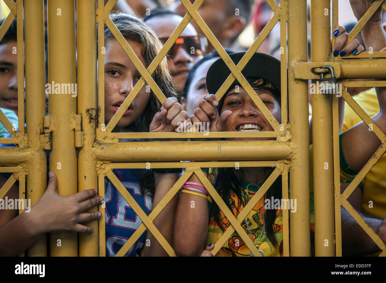 2014 FIFA World Cup - Brazilian football fans crowd outside the gate as ...