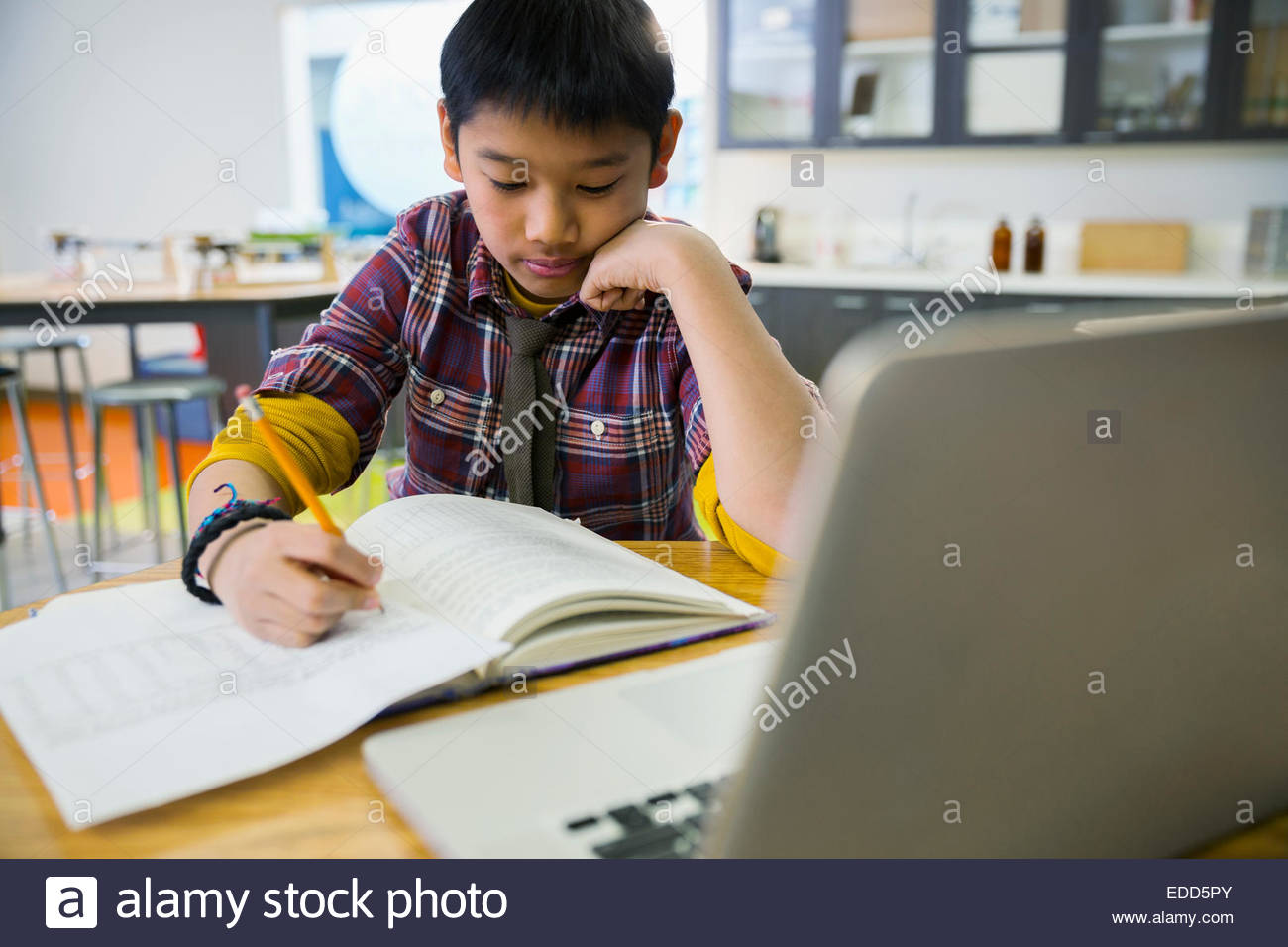 Elementary boy laptop hi-res stock photography and images - Alamy