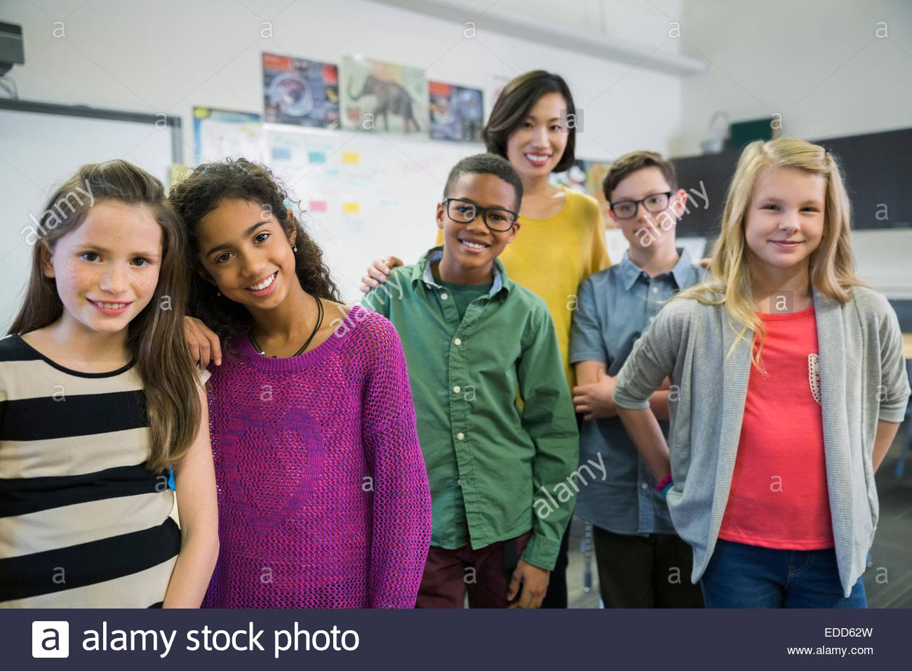 Happy teacher and students classroom hi-res stock photography and ...