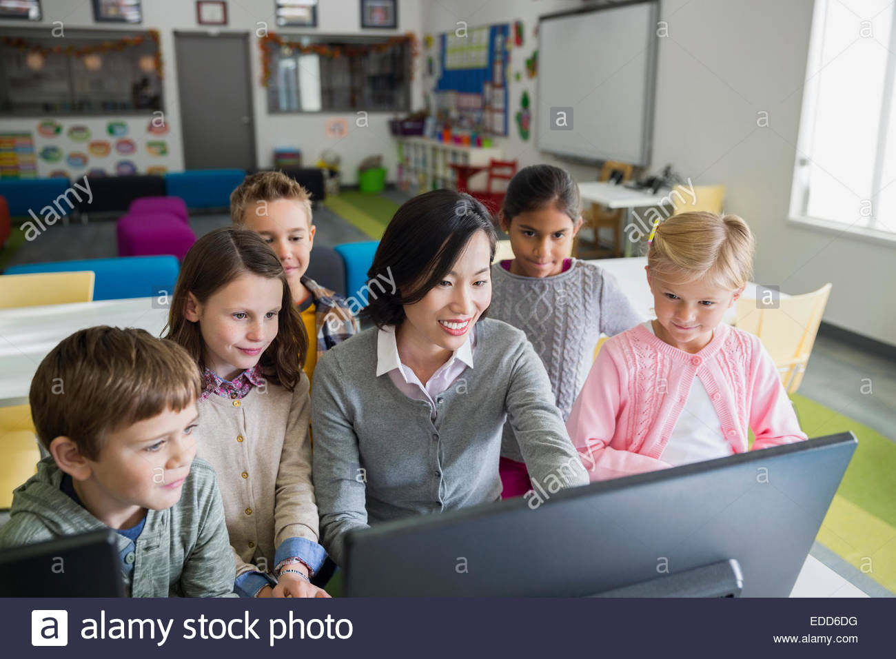 Asian teacher computer hi-res stock photography and images - Alamy