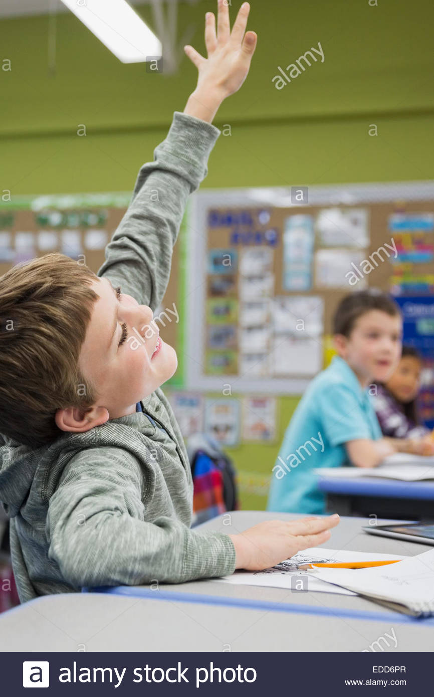 Hand raised class hi-res stock photography and images - Alamy