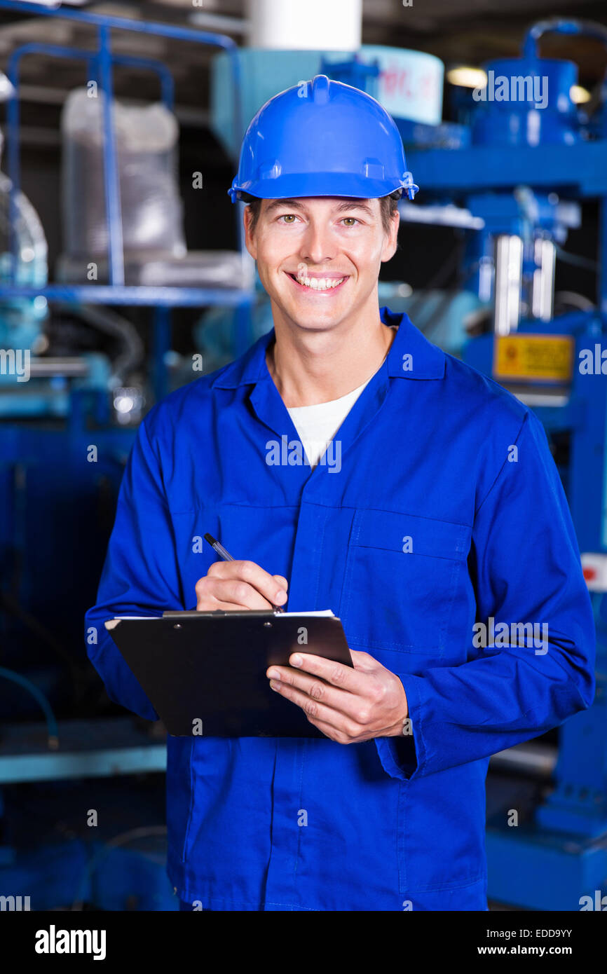 handsome factory manager in production area Stock Photo - Alamy