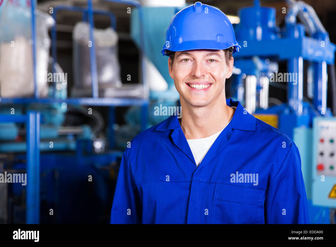 handsome male factory technician looking at the camera Stock Photo - Alamy