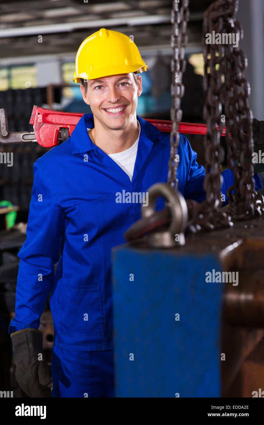 good looking male industrial repairman in workshop Stock Photo - Alamy