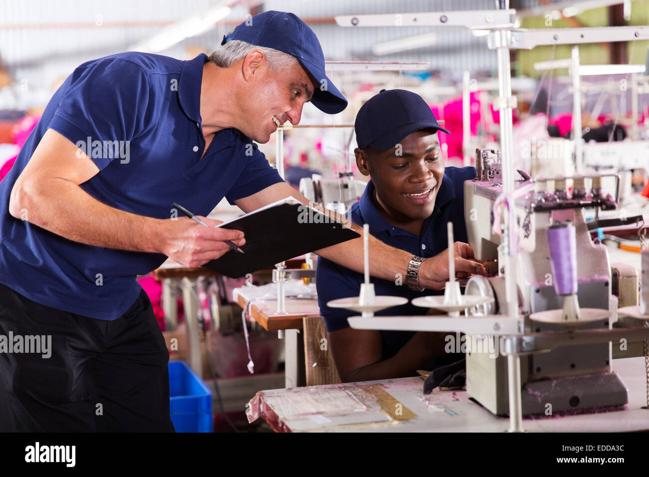 African clothing factory sewing colleagues hi-res stock photography and ...