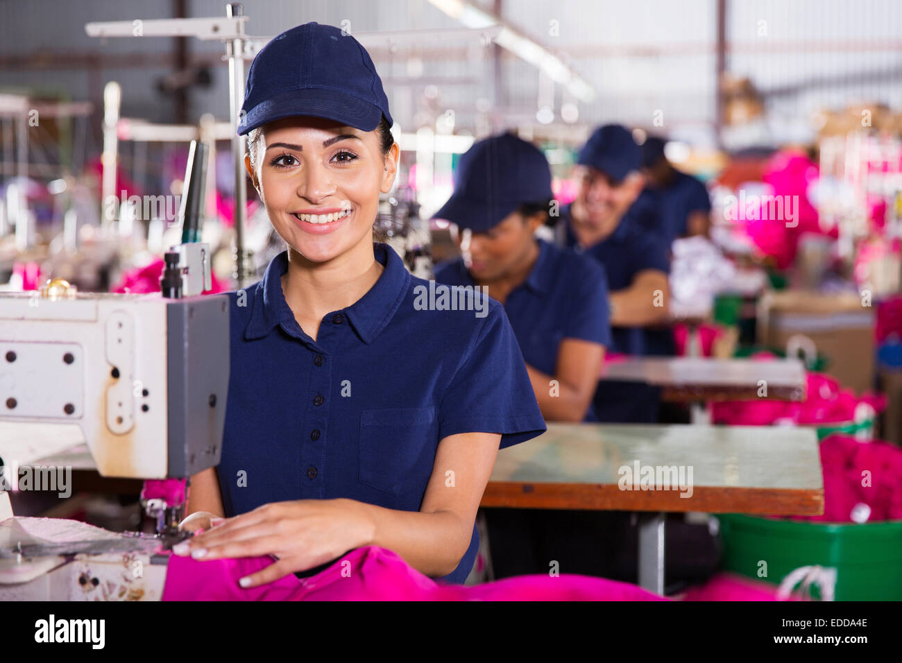 Woman using industrial sewing machine hi-res stock photography and ...