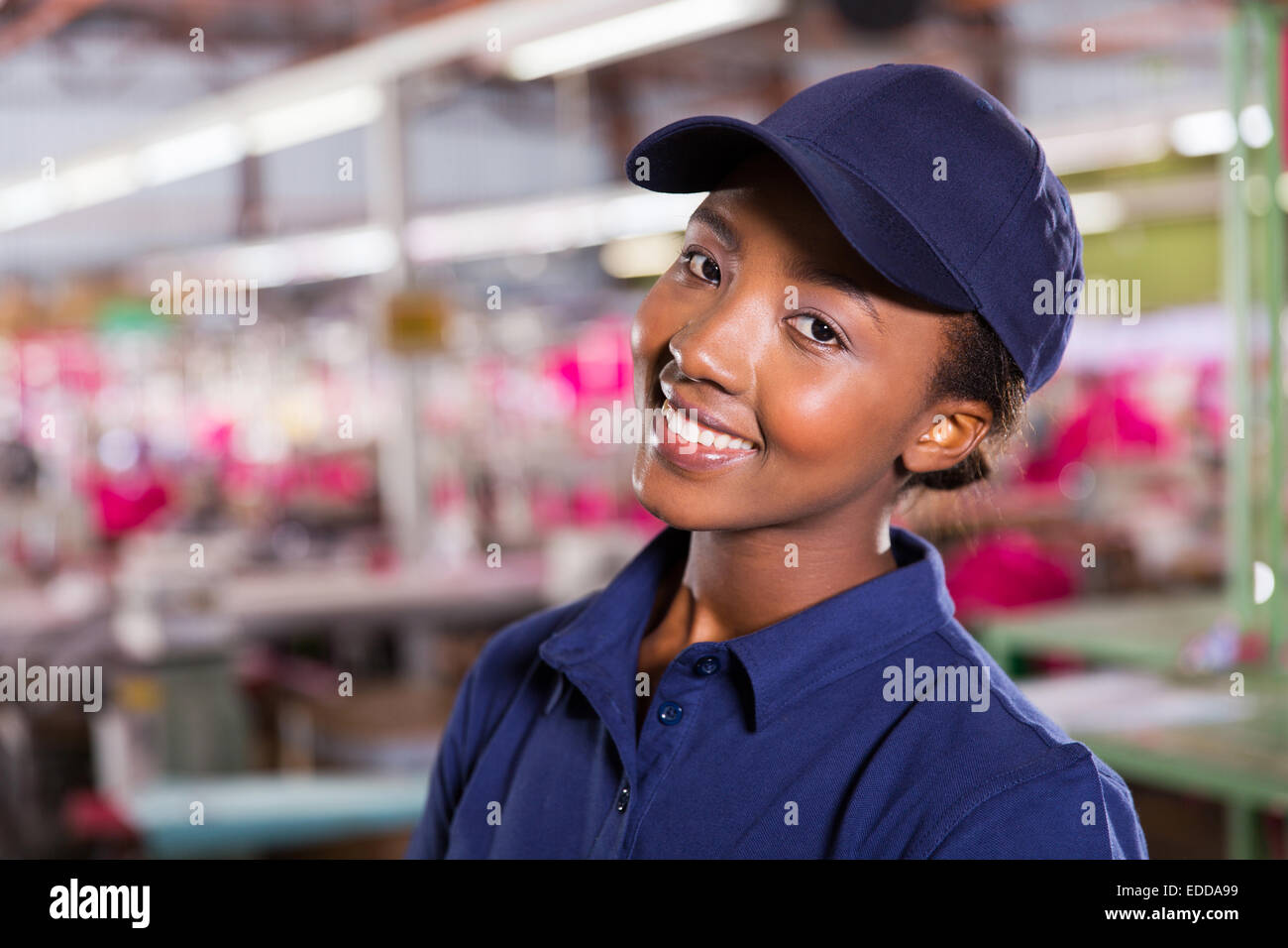 close up portrait of pretty female African textile worker Stock Photo ...