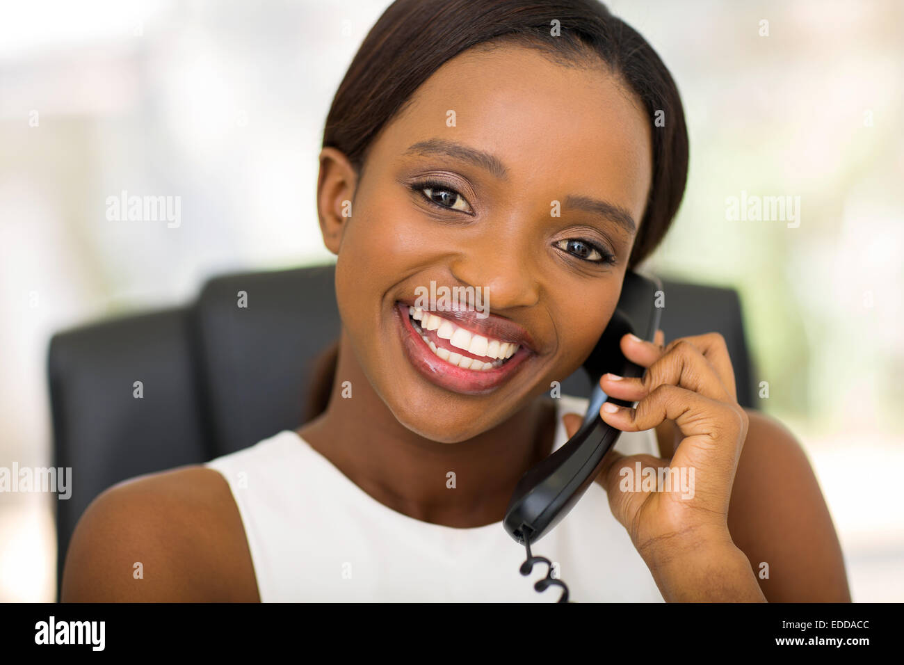 pretty African businesswoman using landline phone Stock Photo - Alamy pretty African businesswoman using landline phone Stock Photo - Alamy