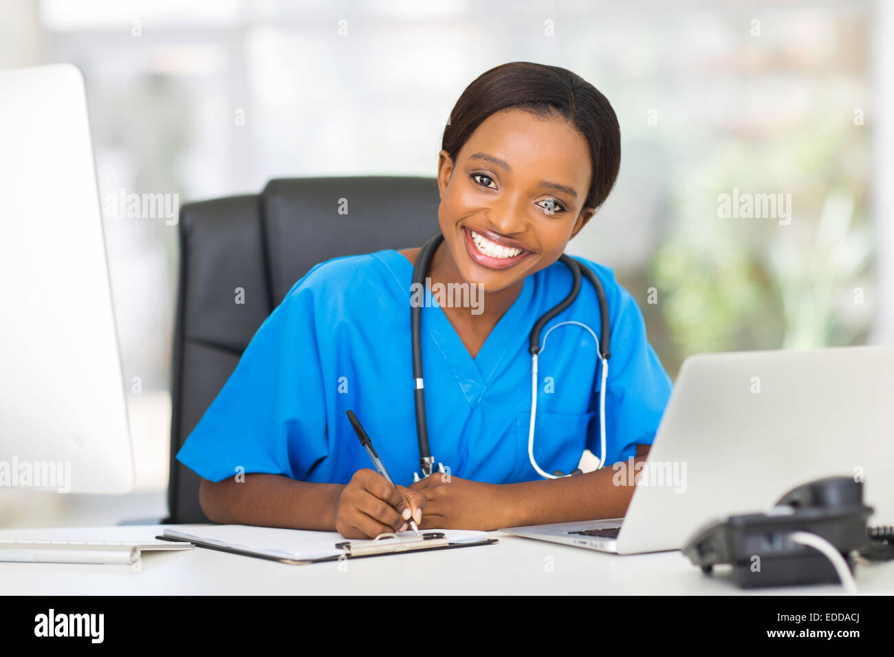 African nurse in white uniform hi-res stock photography and images - Alamy