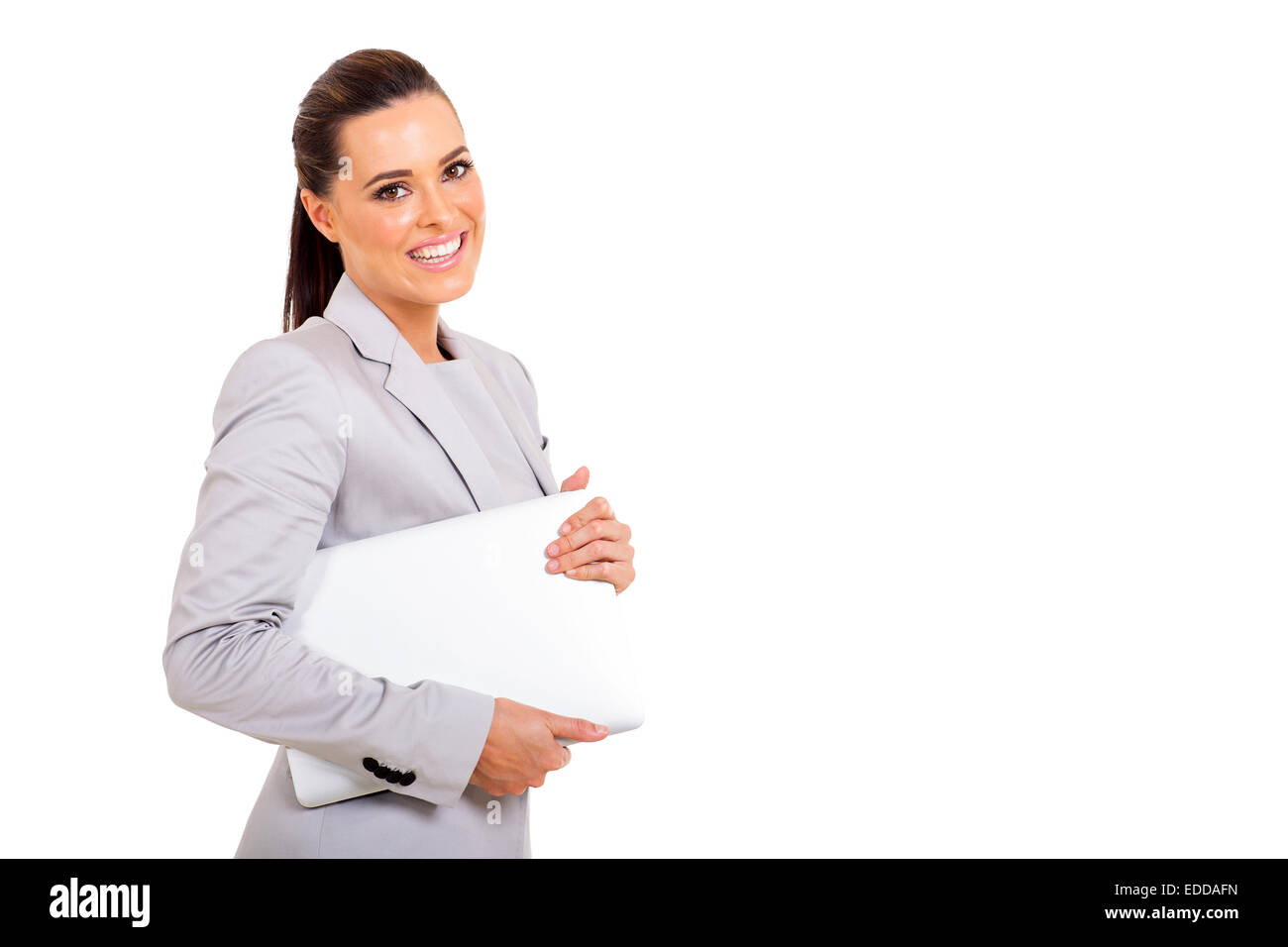 beautiful young corporate worker holding laptop Stock Photo - Alamy