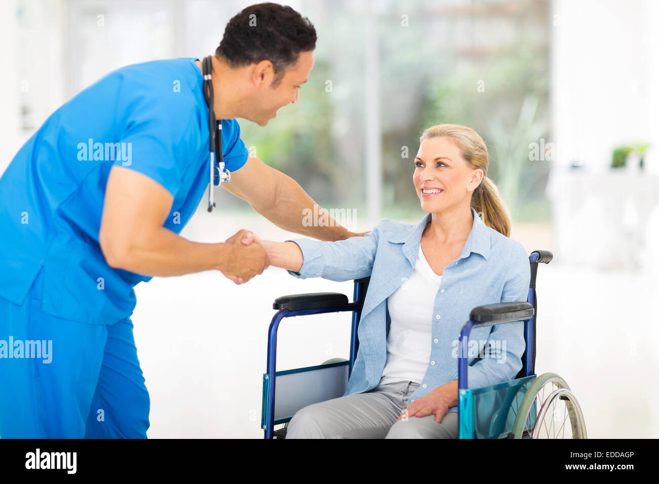 Nurse greeting patient hi-res stock photography and images - Alamy