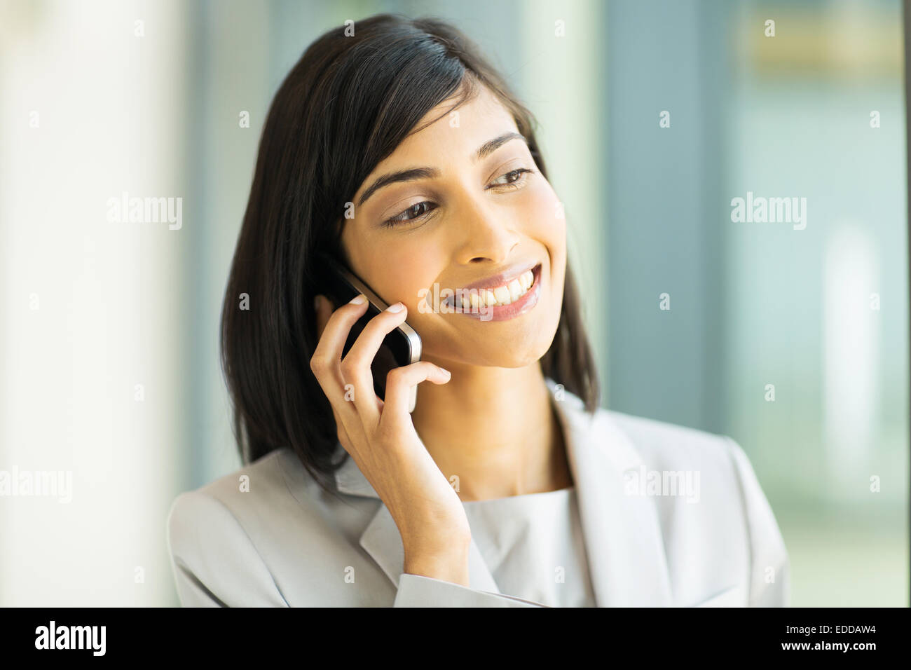 beautiful Indian business executive making a phone call Stock Photo - Alamy