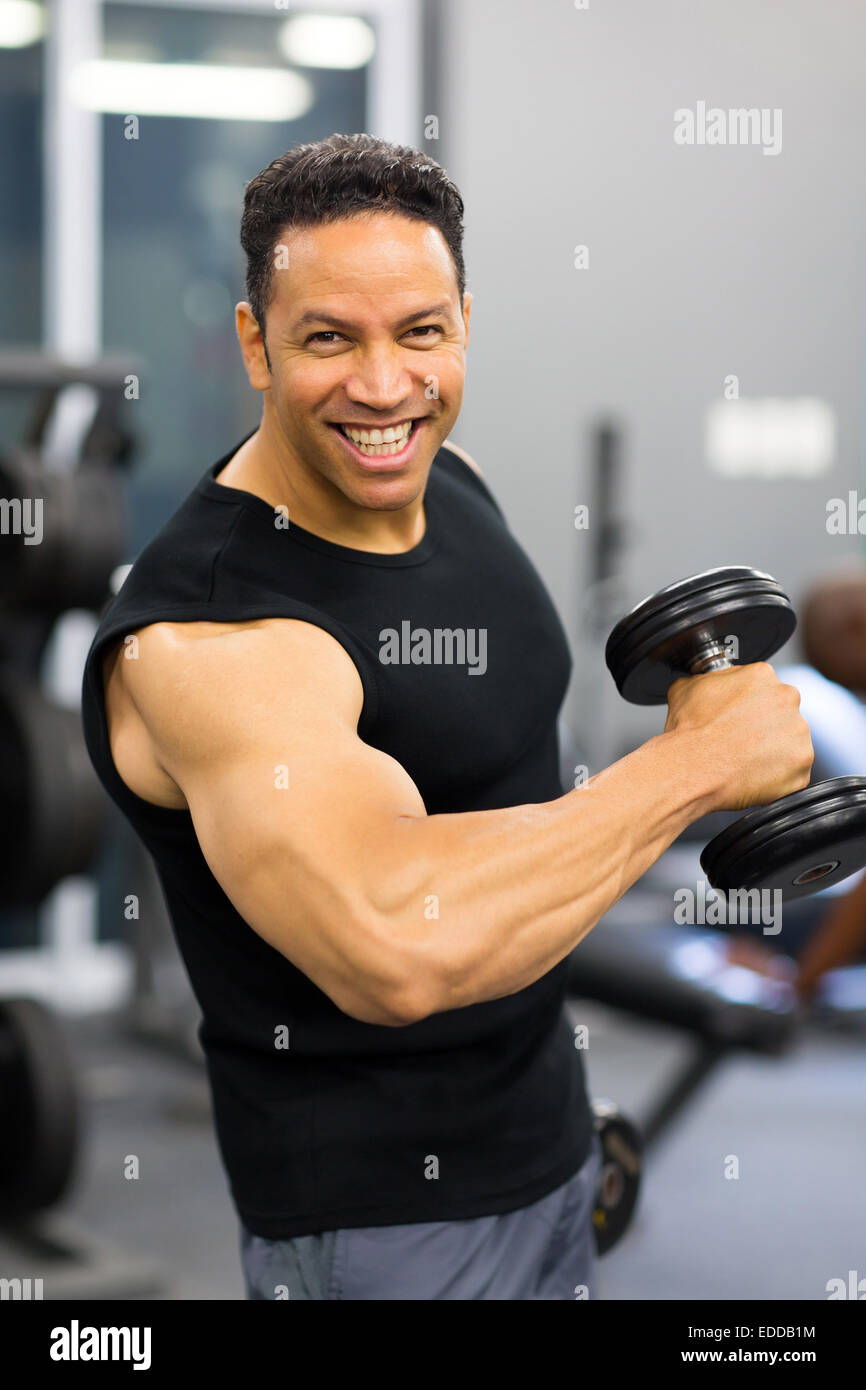 fit mid age man training with dumbbell Stock Photo - Alamy