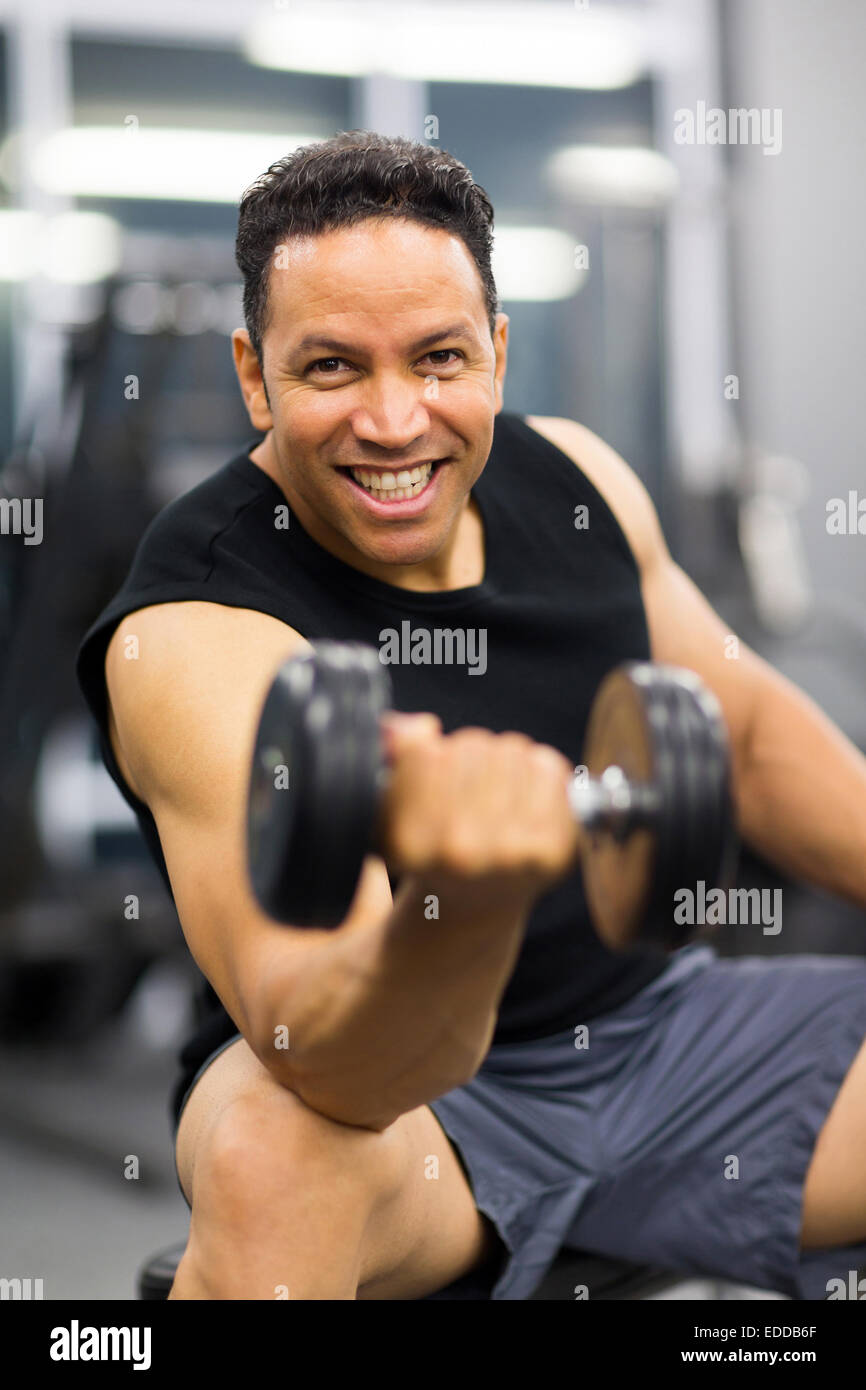 handsome man working out with dumbbell Stock Photo - Alamy