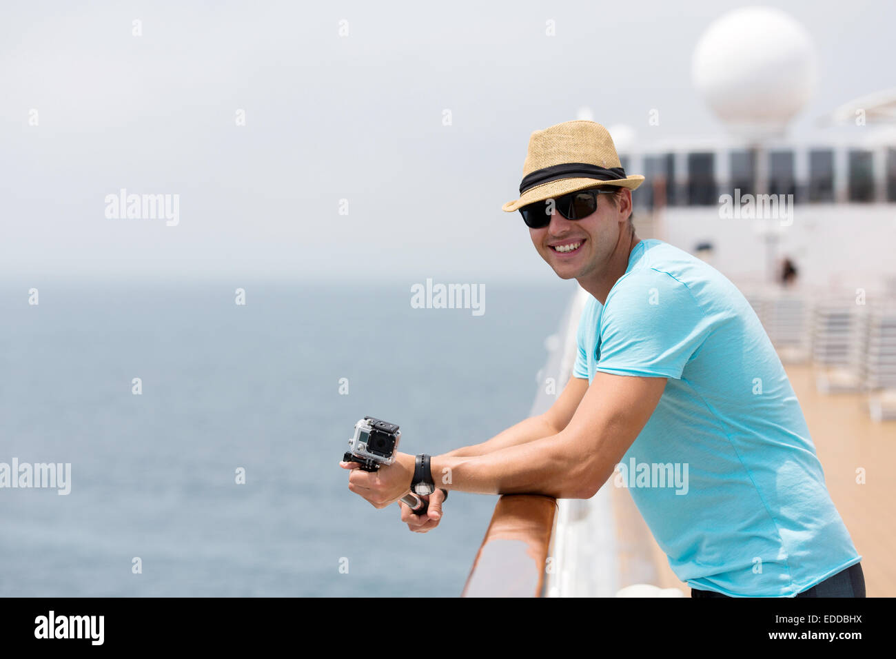 Young man on ship hi-res stock photography and images - Alamy