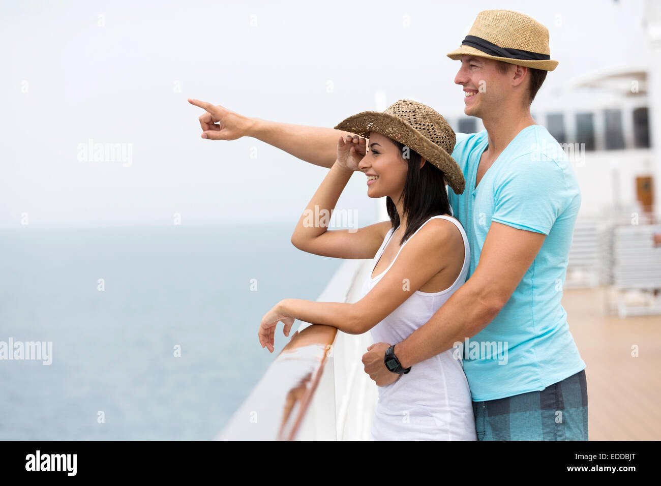romantic couple on a cruise ship and pointing Stock Photo - Alamy