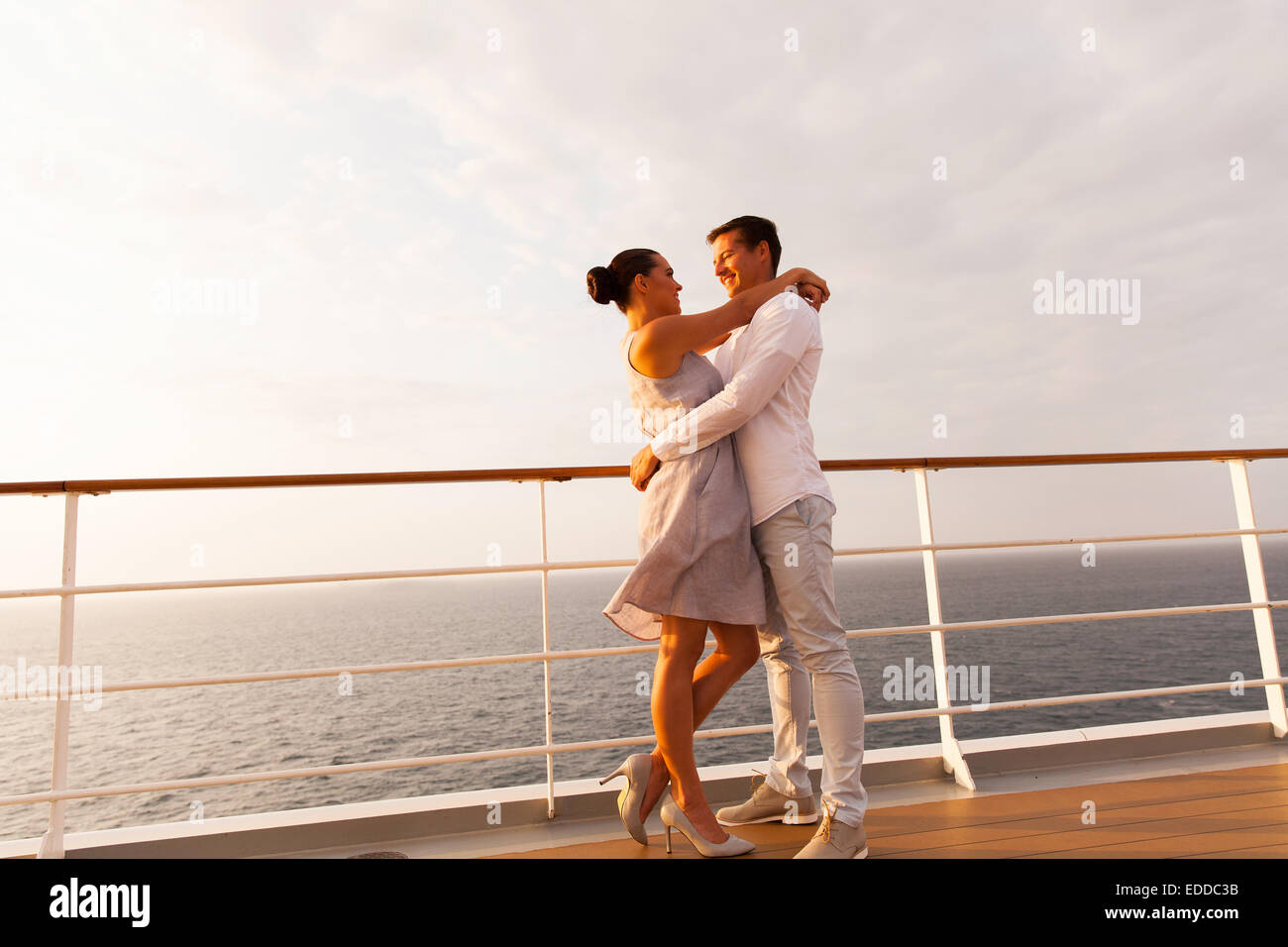 full length portrait of lovely couple hugging on cruise Stock Photo - Alamy