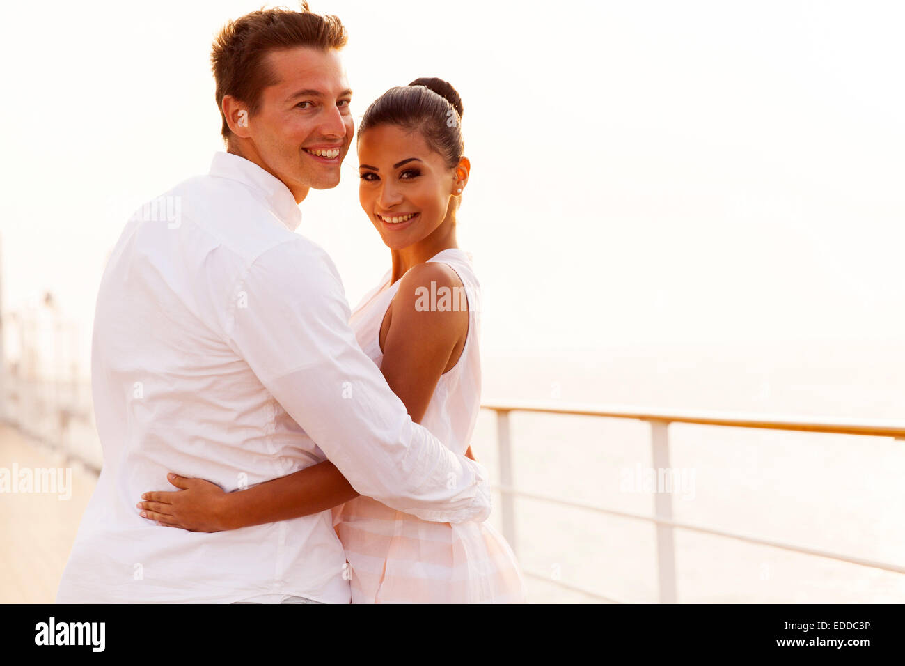 Beautiful newlywed couple looking back hi-res stock photography and ...