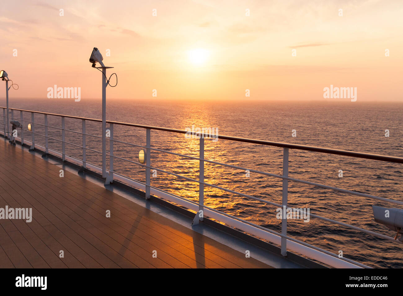 deck of a cruise ship at sunrise Stock Photo - Alamy