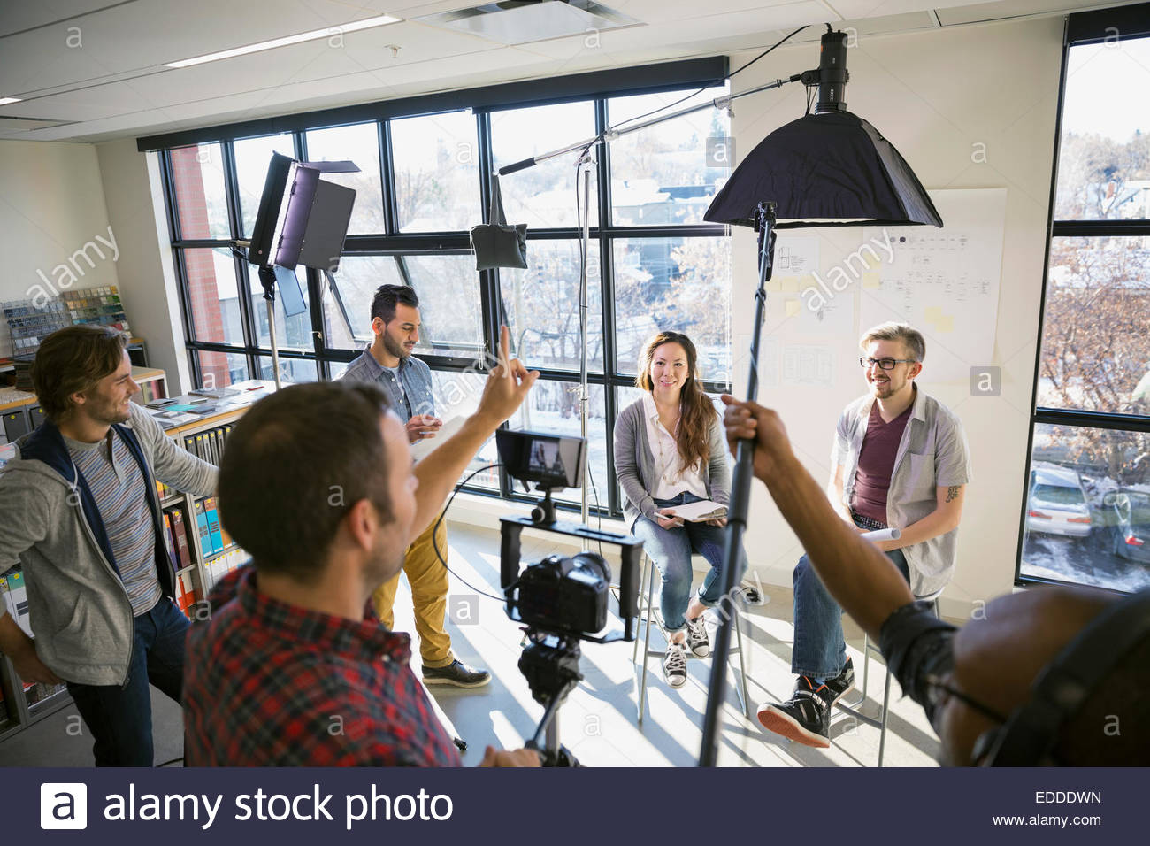 Business people shooting video tutorial Stock Photo - Alamy