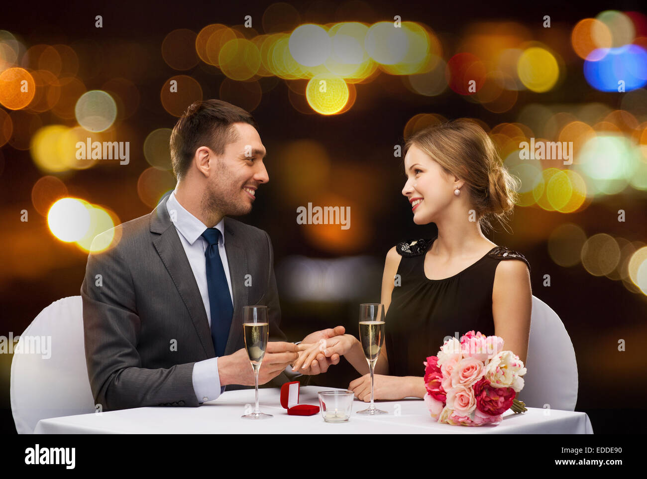 man proposing to his girlfriend at restaurant Stock Photo - Alamy