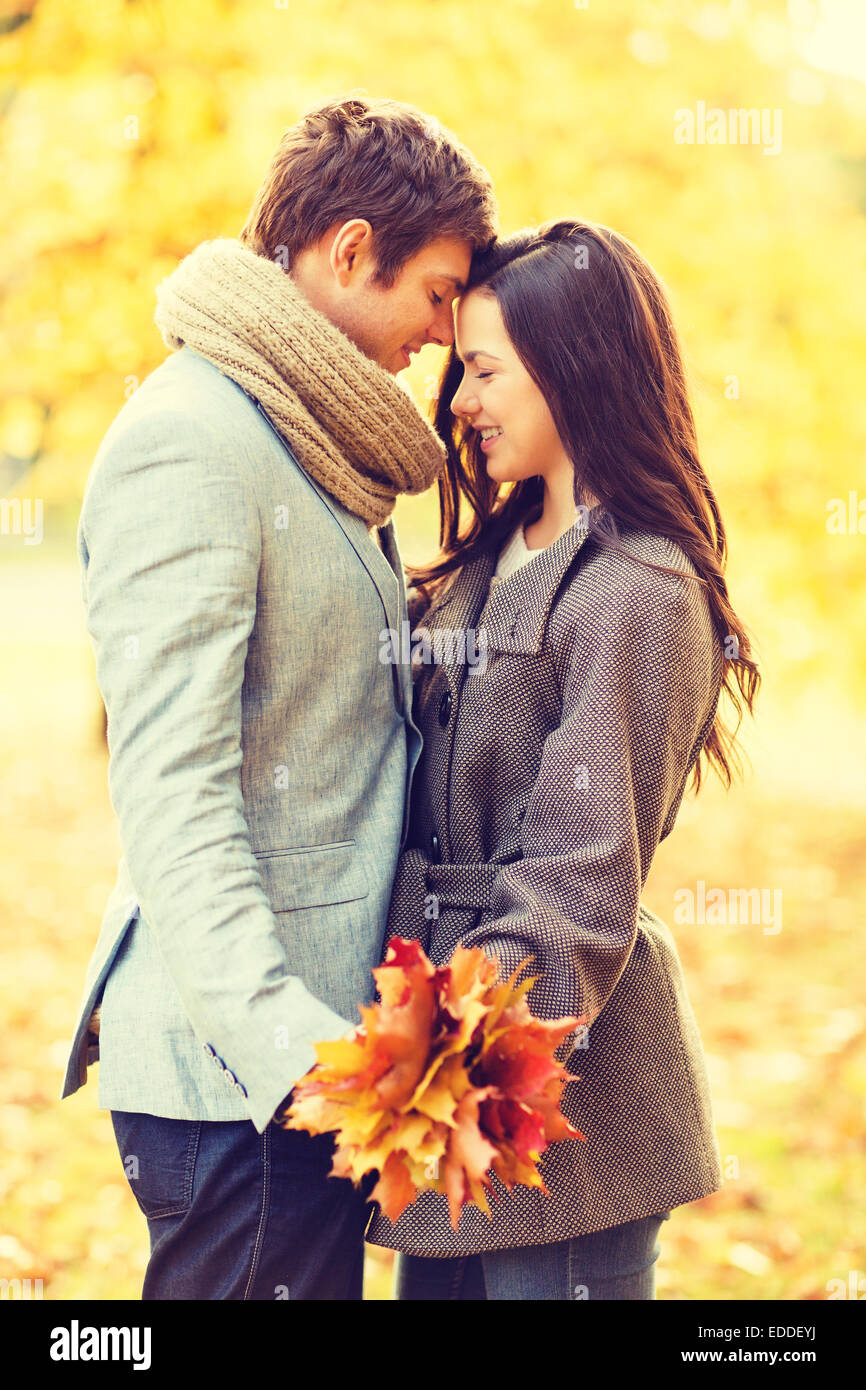 romantic couple kissing in the autumn park Stock Photo - Alamy