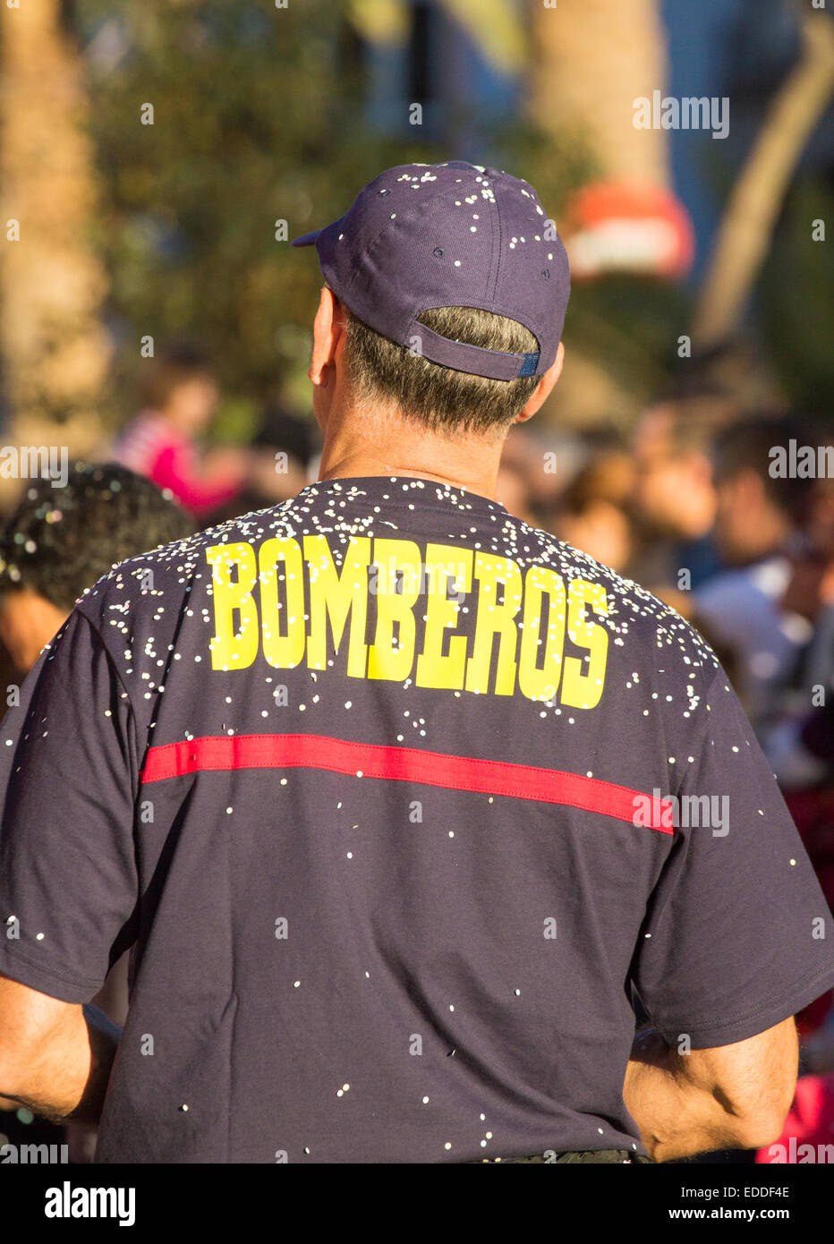 Fireman, firefighter (Bombero) on duty during fiesta street parade in ...