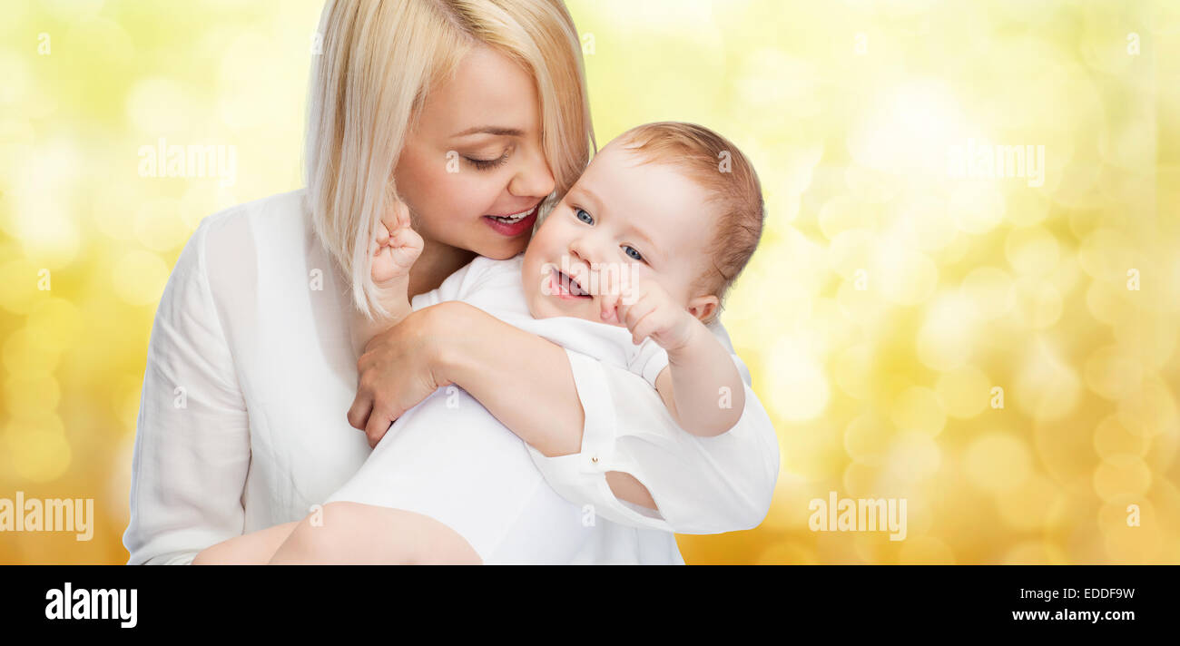 happy mother with smiling baby Stock Photo - Alamy